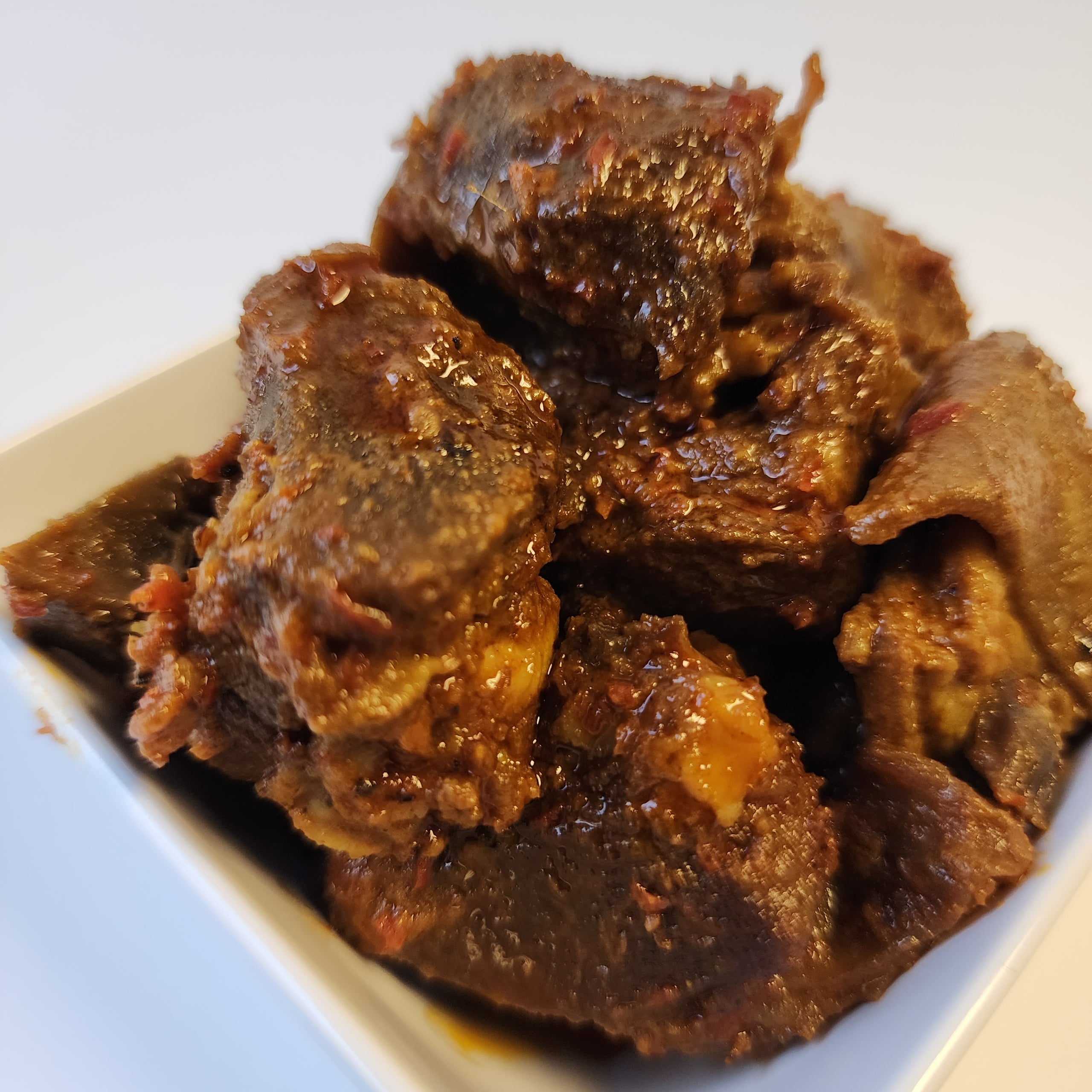 Curry Goat with pepper sauce | Sankofa Kitchen International Lunch